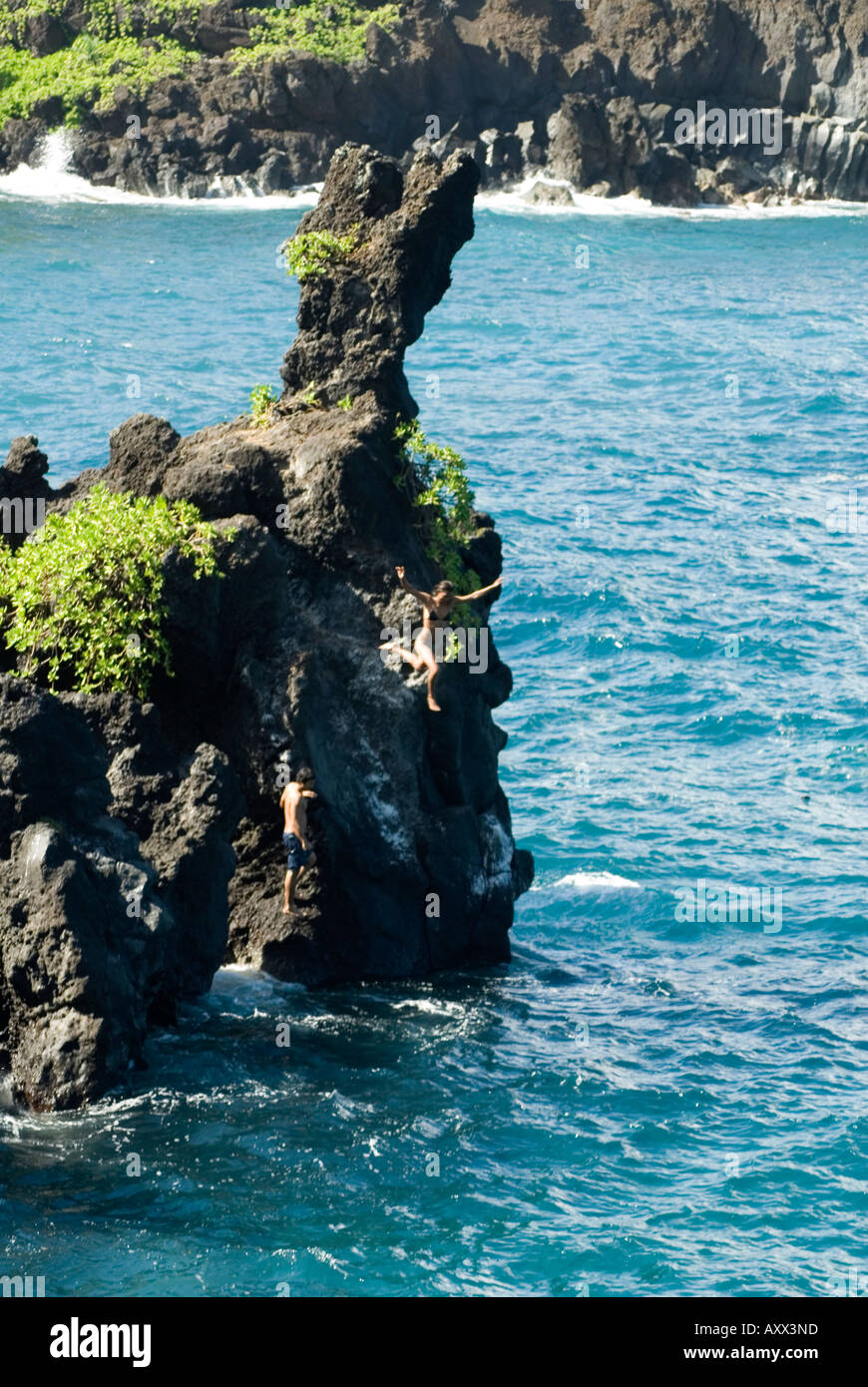 Dive from the cliff: Girl Stock Photo - Alamy