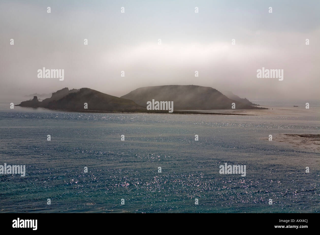 view of eastern rocks from st martin s isles of scilly in misty ...