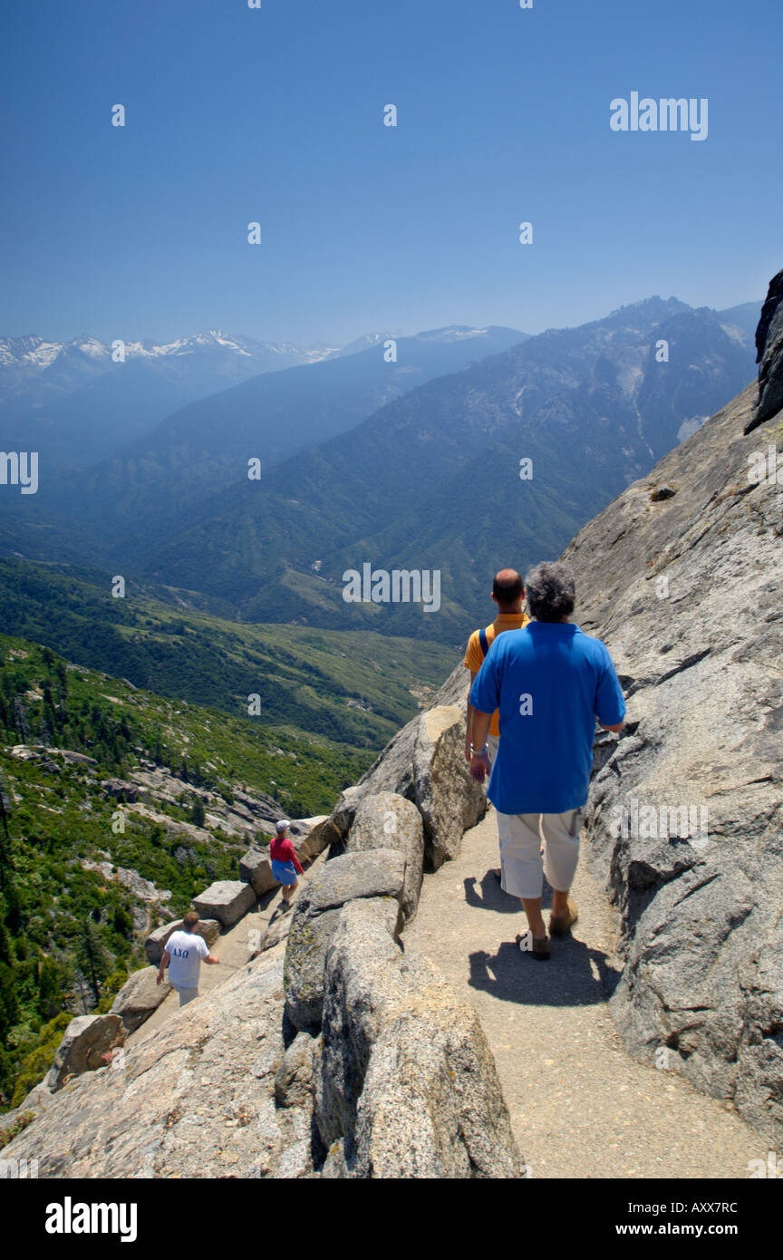 People walking down rocky path hi-res stock photography and images - Alamy