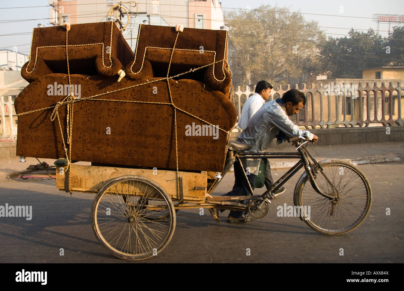 A cycle rickshaw with a three piece suit in India Stock Photo - Alamy