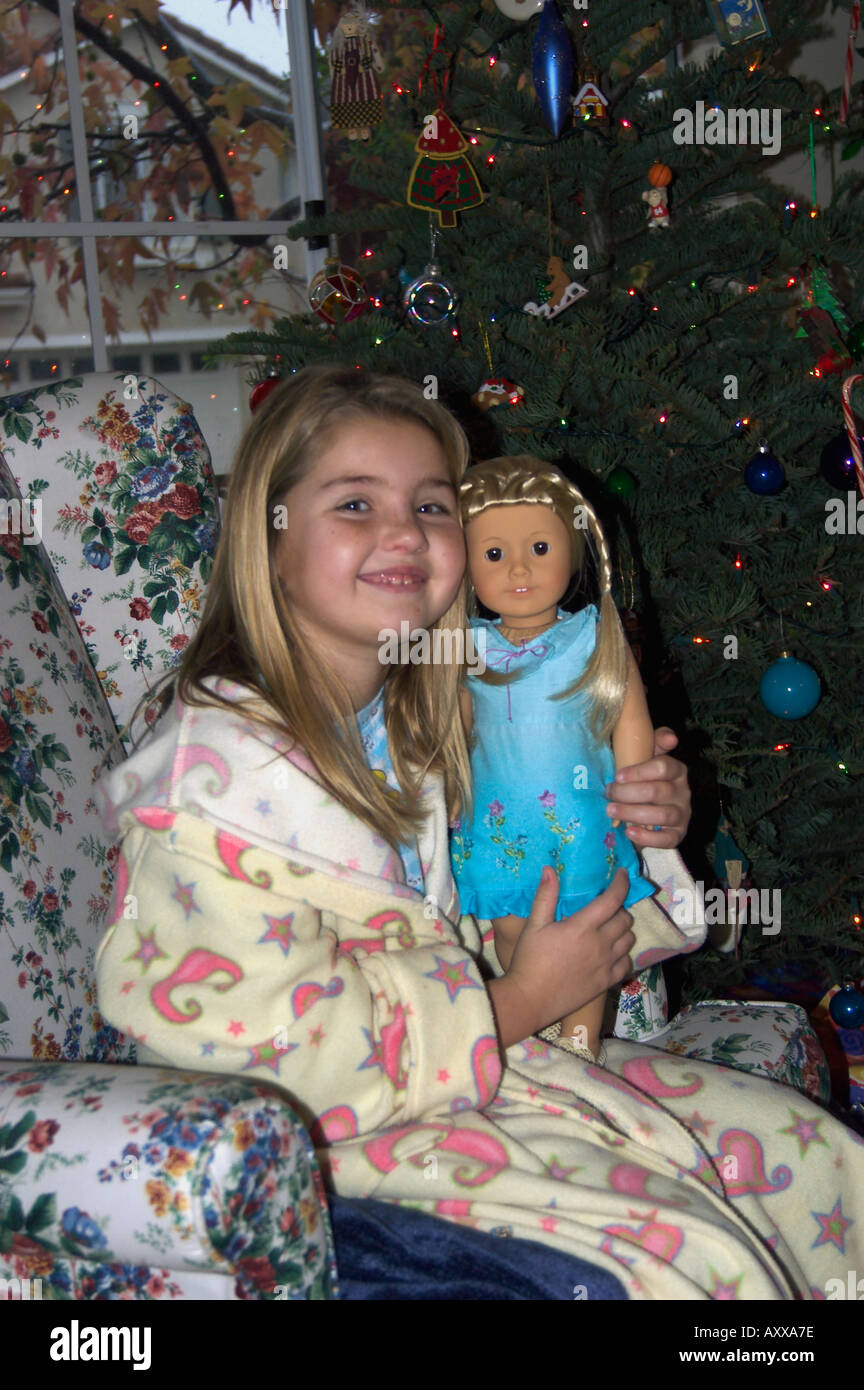 Christmas doll present Stock Photo - Alamy
