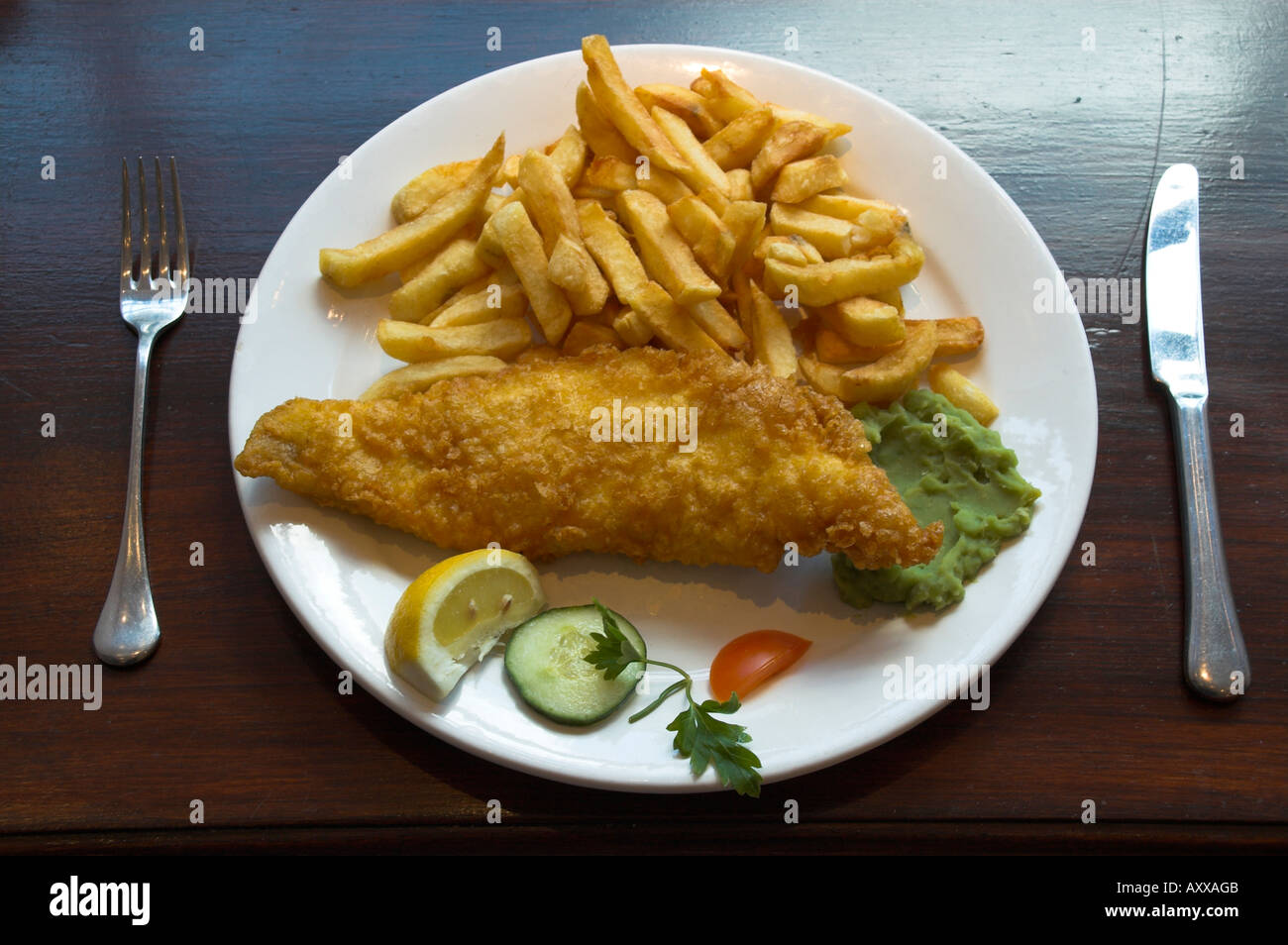 gourmet fish and chips with mushy peas Stock Photo - Alamy