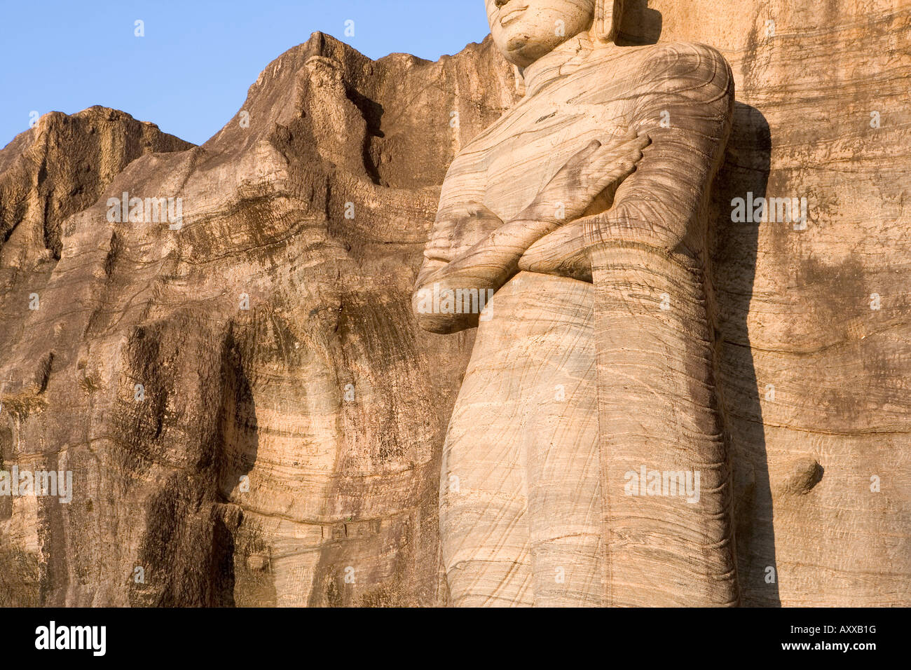 Rock carved granite image of the 7m tall standing Buddha, Gal Vihara ...