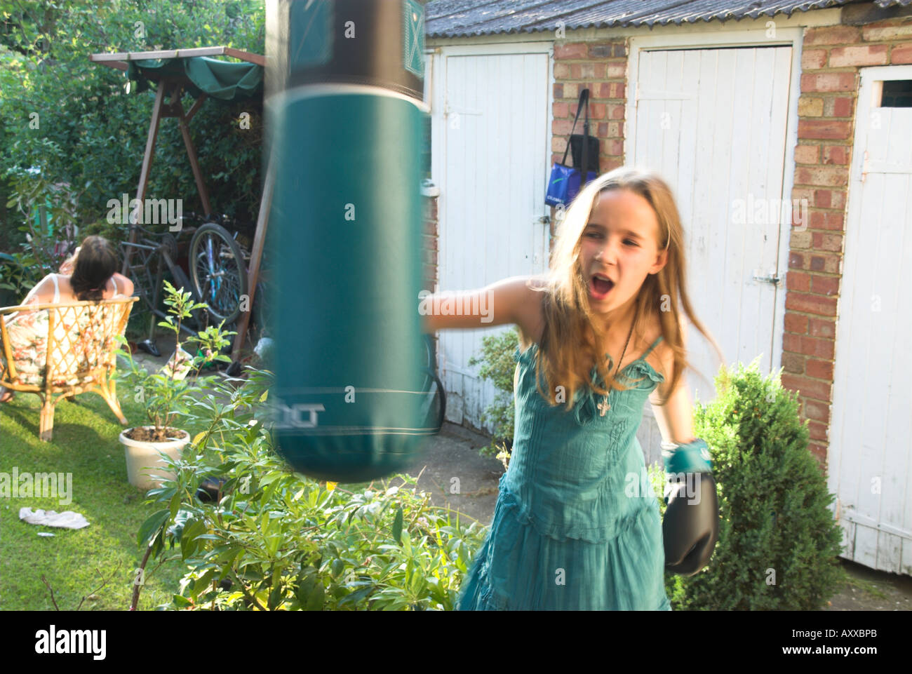 girl child boxing punchbag Stock Photo - Alamy