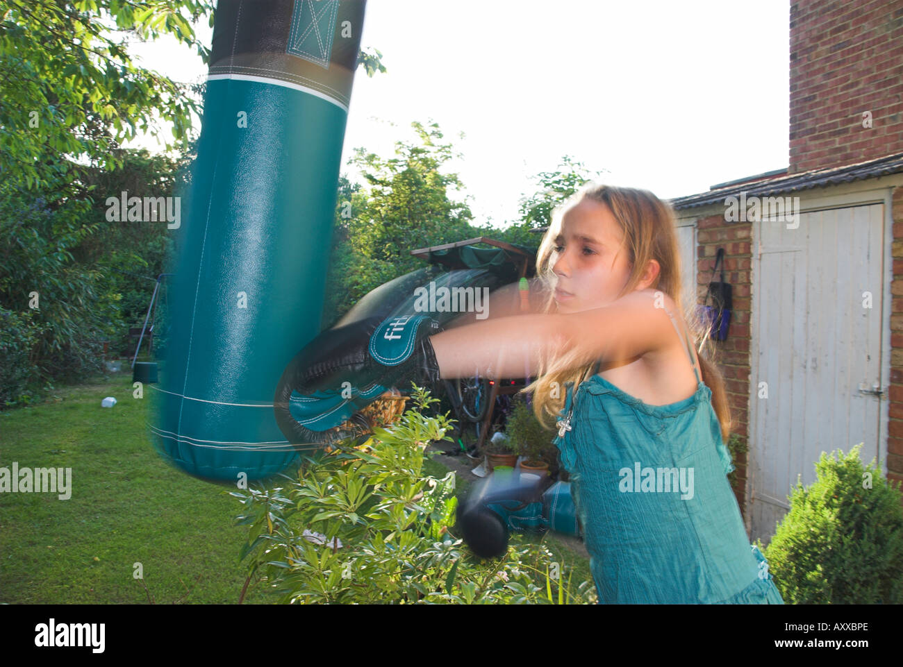 girl child boxing punchbag Stock Photo - Alamy