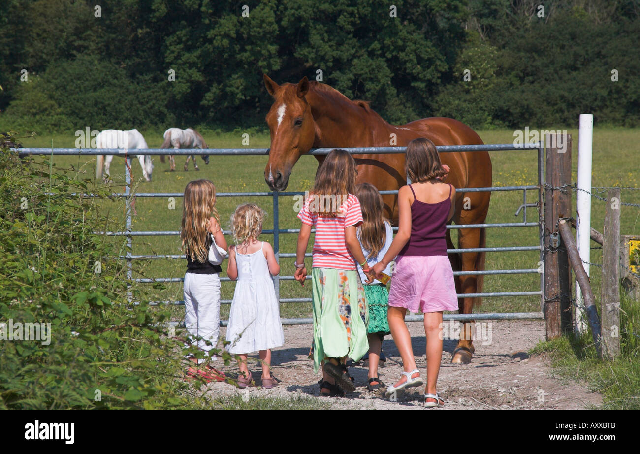 Children with horse hi-res stock photography and images - Alamy