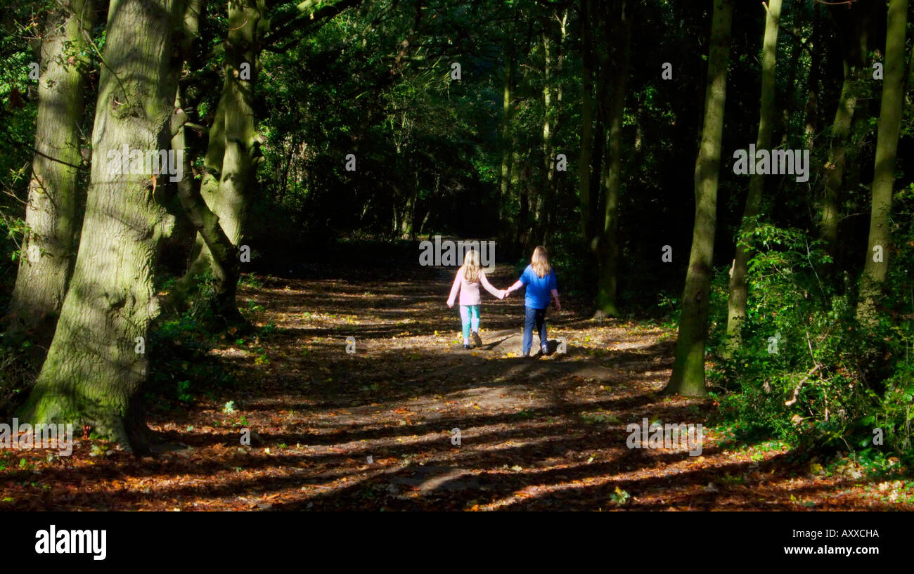 europe uk england surrey forest path children playing Stock Photo - Alamy