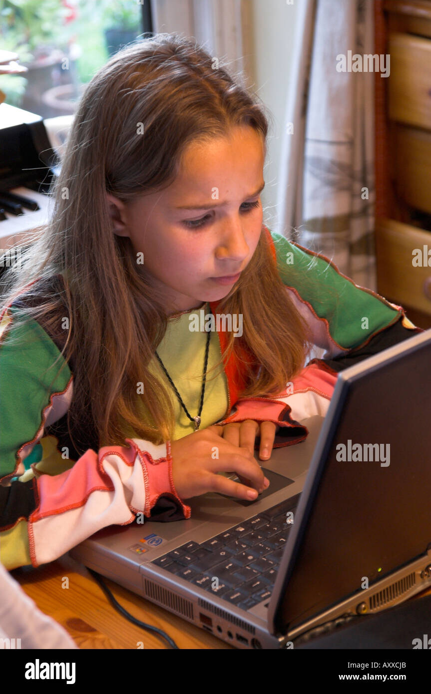 girl child working with laptop computer Stock Photo - Alamy