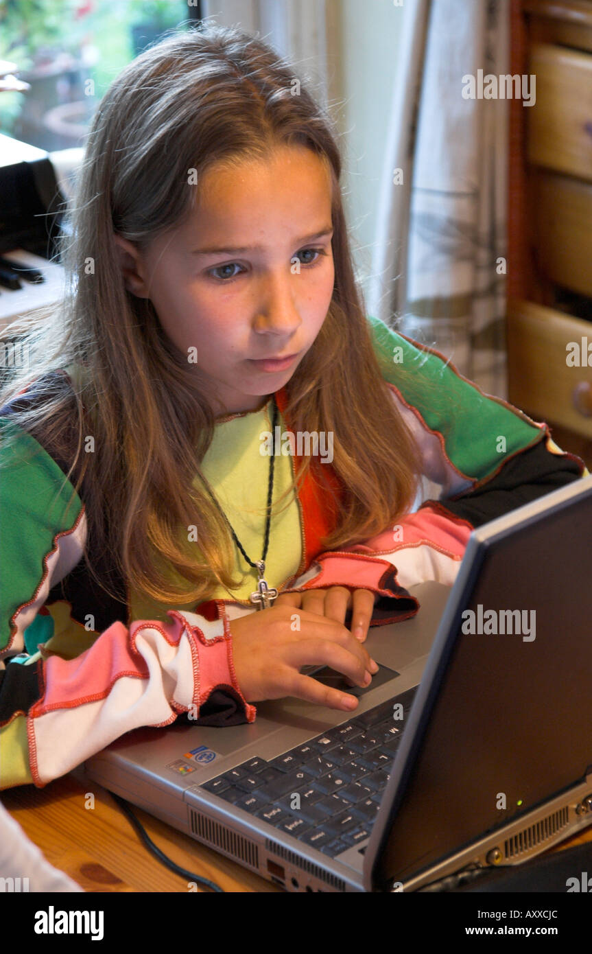 girl child working with laptop computer Stock Photo - Alamy