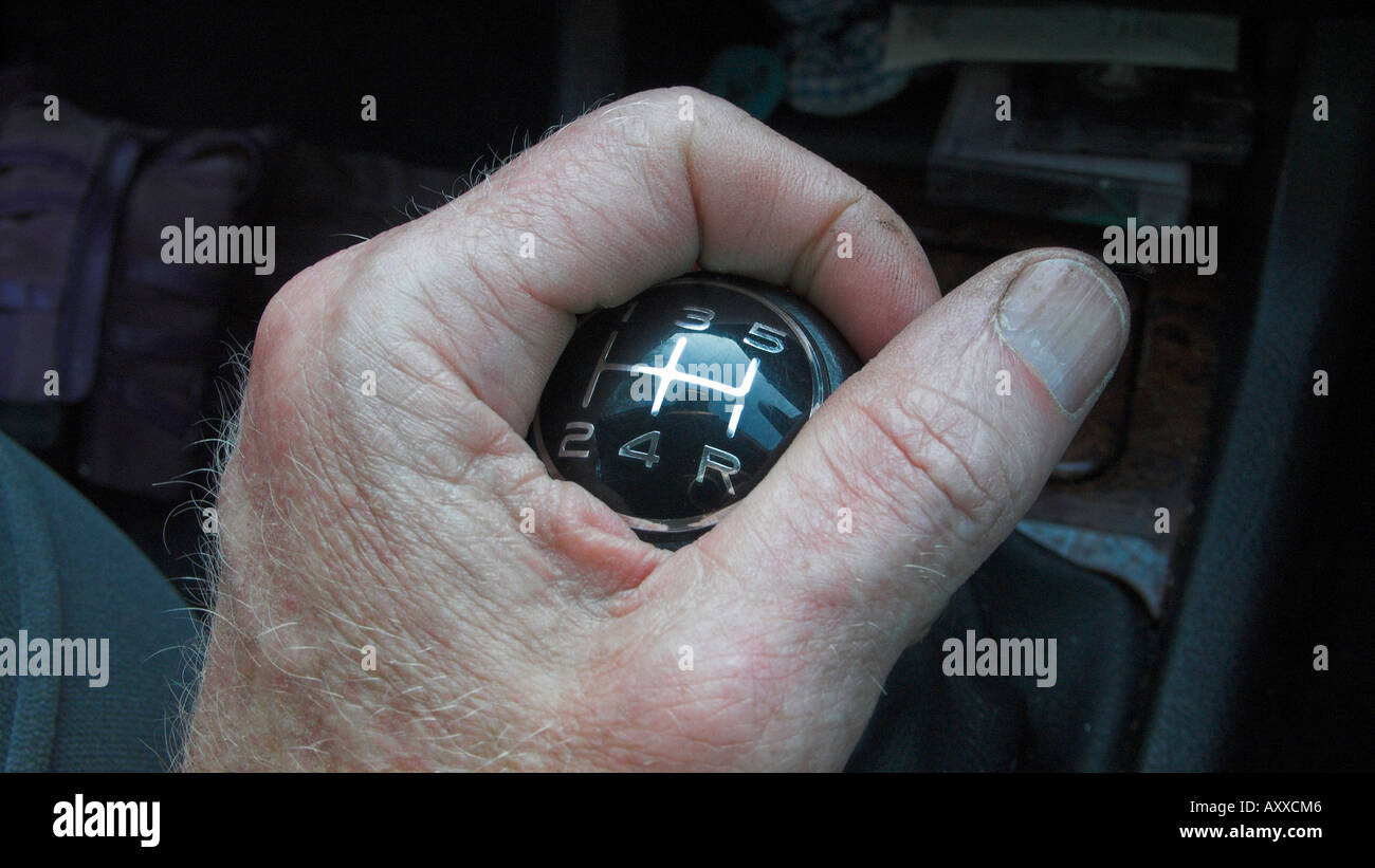 hand on car control gearstick Stock Photo - Alamy