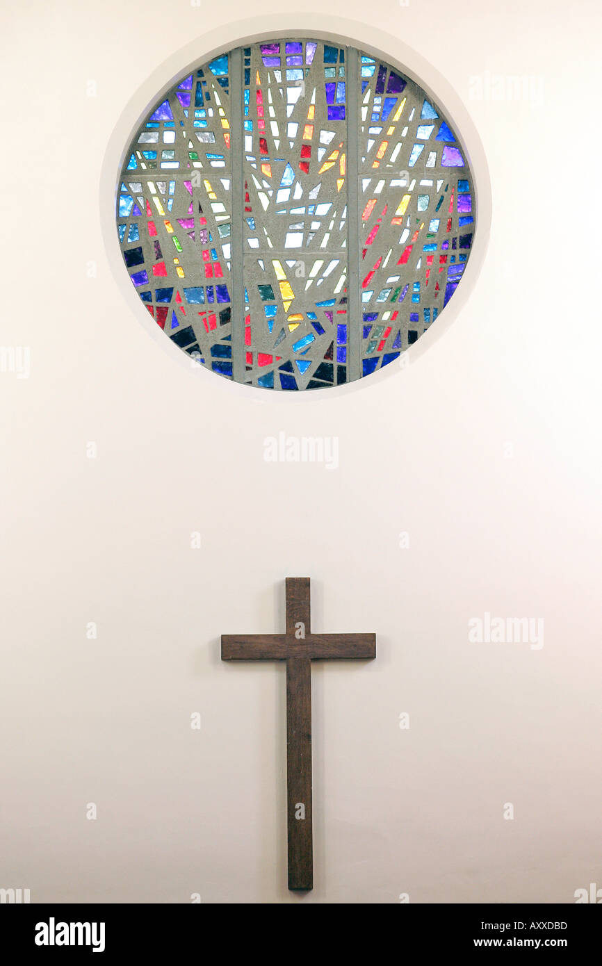Christian cross and stained glass inside a church Stock Photo - Alamy