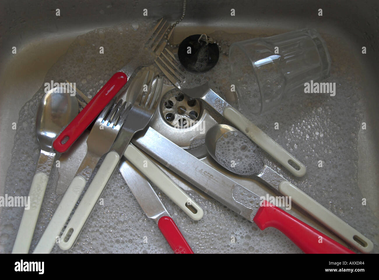 Washing forks hi-res stock photography and images - Alamy