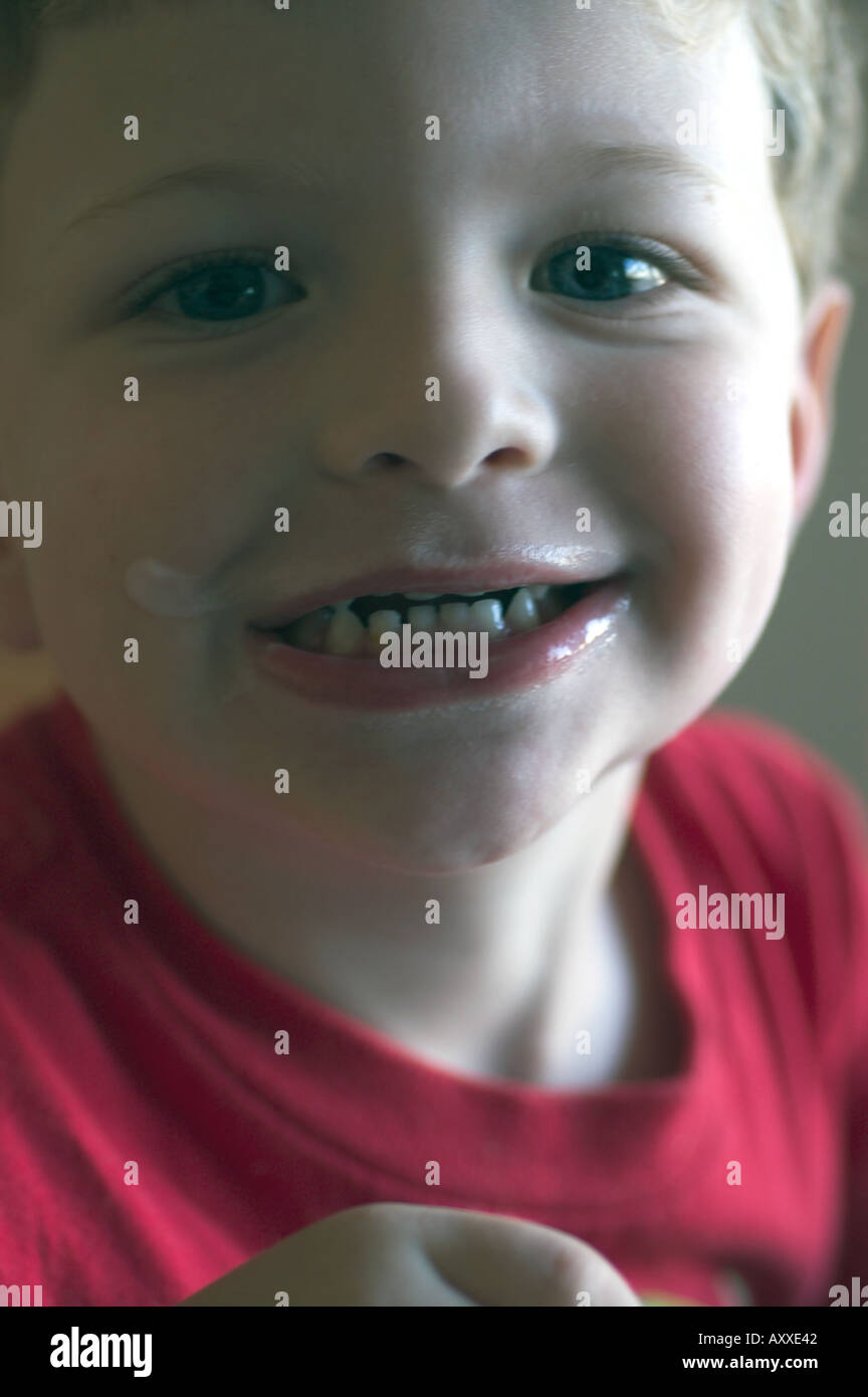 boy with food on face Stock Photo - Alamy