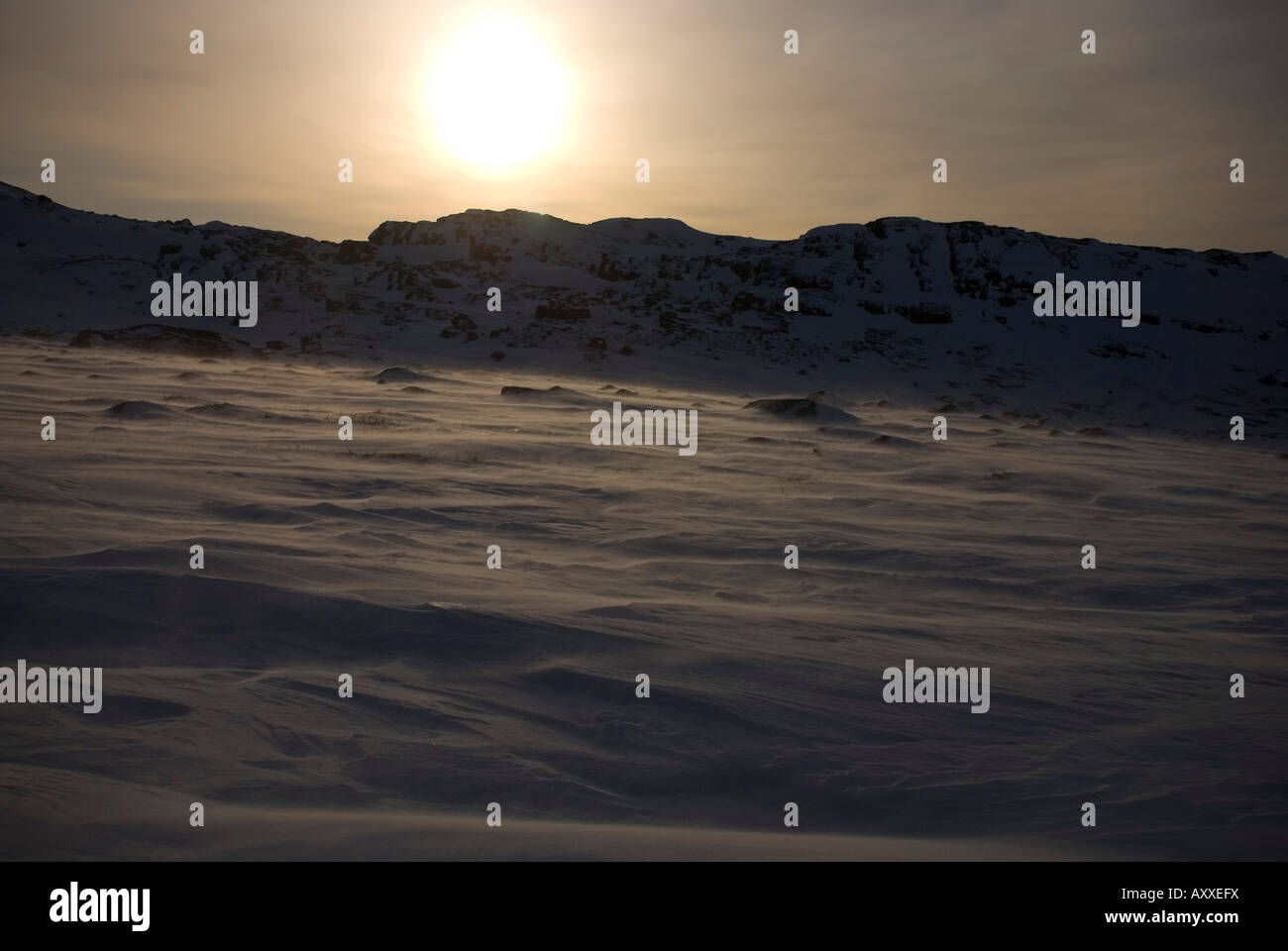 The arctic winds creates spindrift on the snow Stock Photo - Alamy