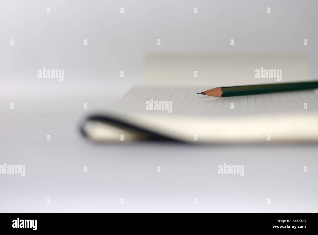 Notebook with pencil Stock Photo - Alamy