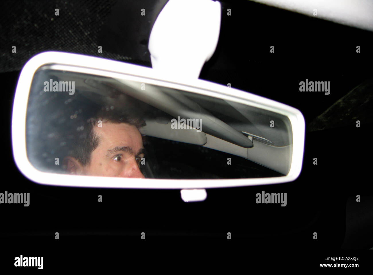 Car rear view mirror eyes wide hi-res stock photography and images - Alamy