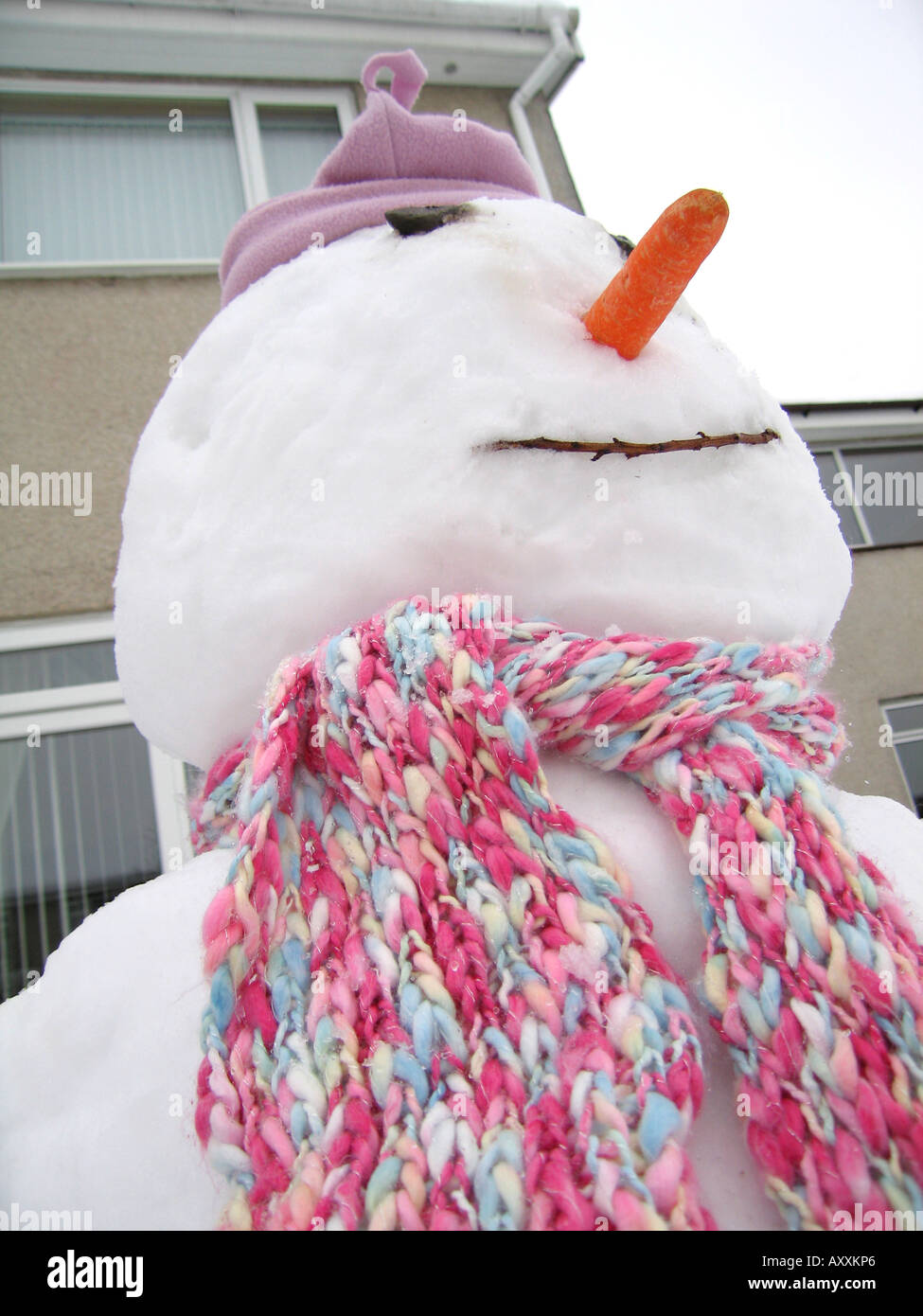 Snowman in front garden of house Stock Photo - Alamy