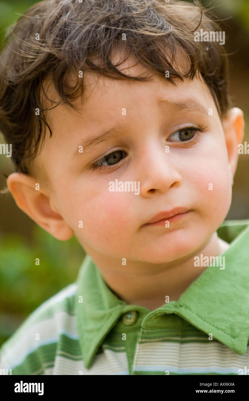 Little boy thinking Stock Photo - Alamy