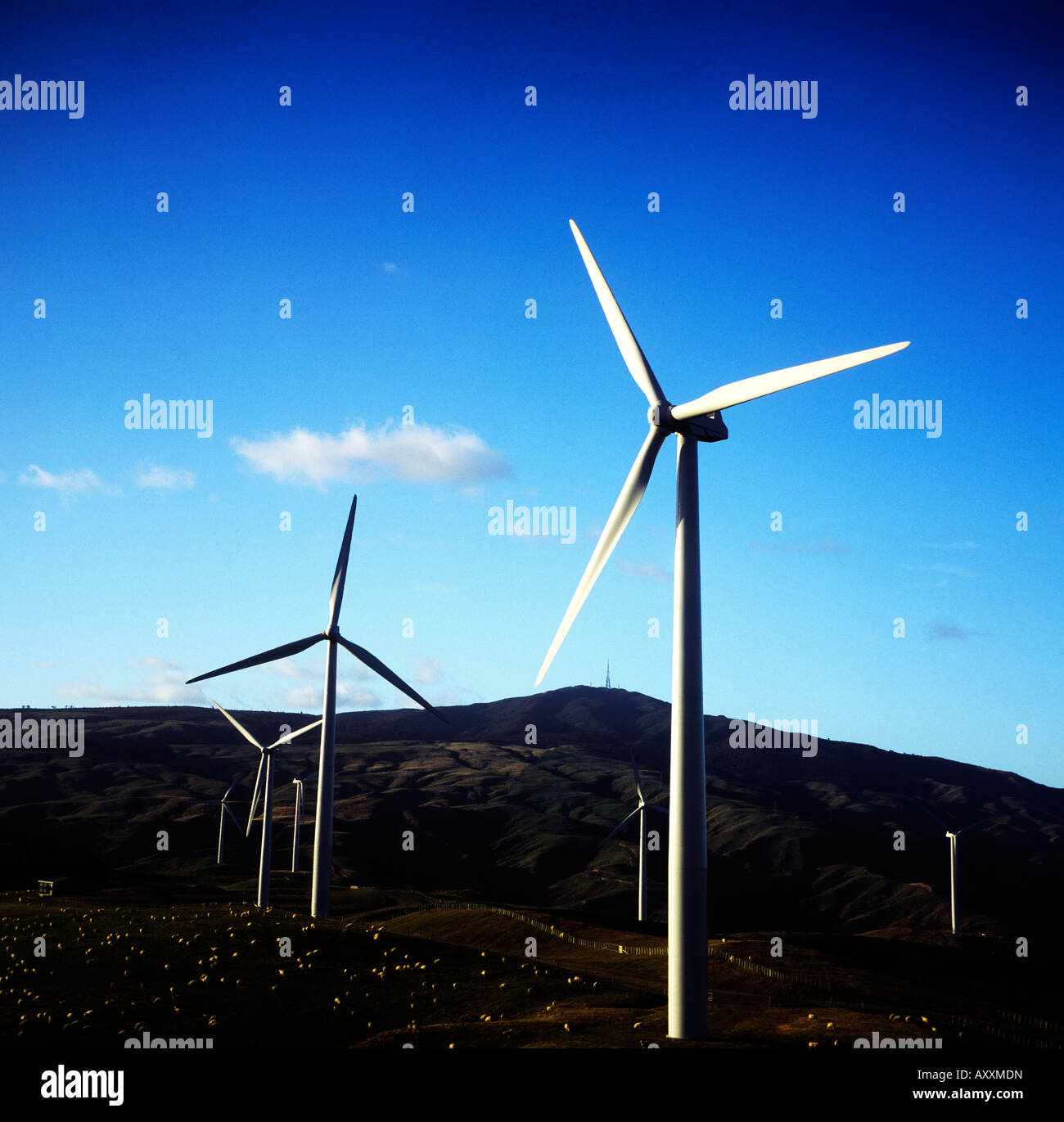stark wind turbines on hillside Stock Photo - Alamy