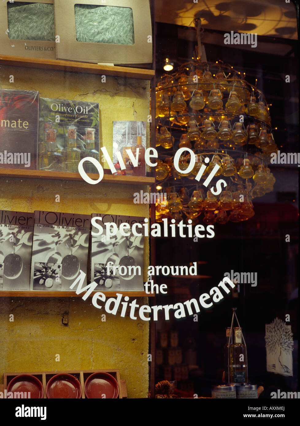 window of olive oil shop with sign writing Stock Photo - Alamy