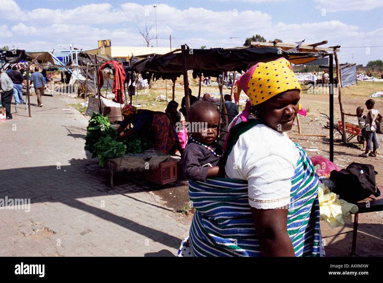 Mother and son pose for the camera at market hi-res stock photography ...