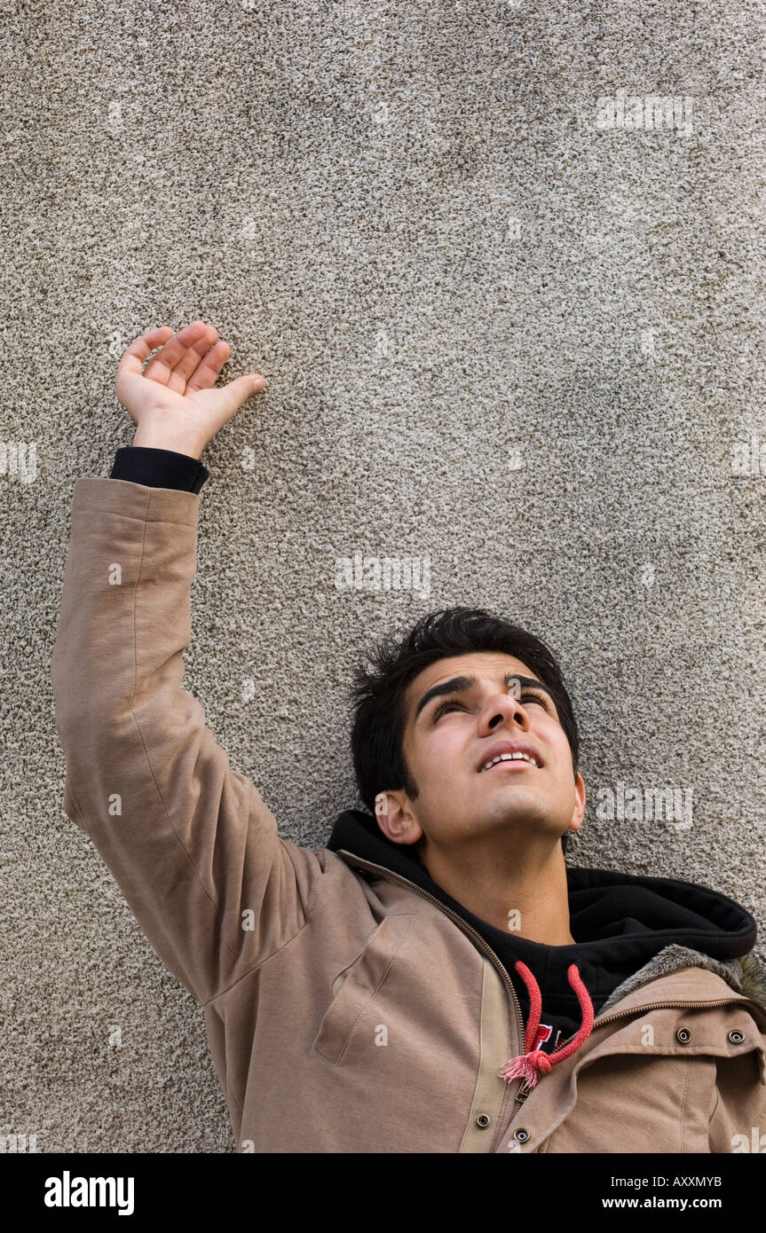man reaching up Stock Photo - Alamy