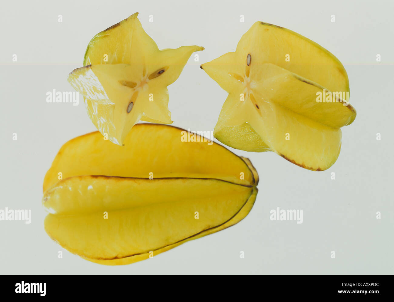 Star fruit whole and cut in half Stock Photo - Alamy