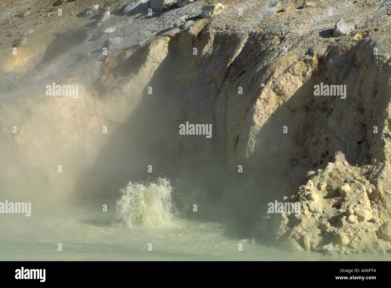 Bubbling boiling water in geothermal water pool at Bumpass Hell Lassen ...