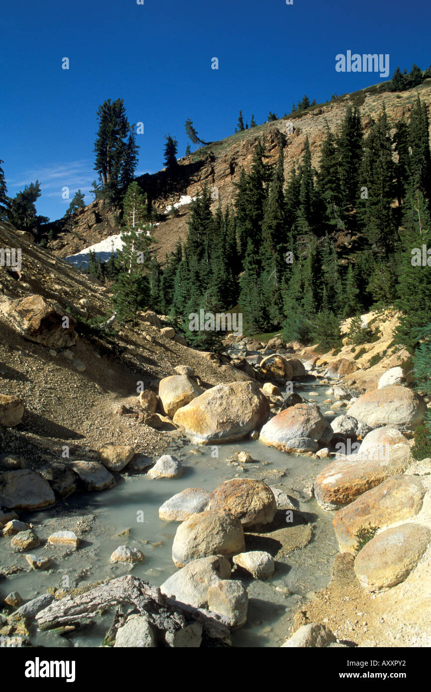 Water from hydrothermal hot spirng stream flows down through hills at ...