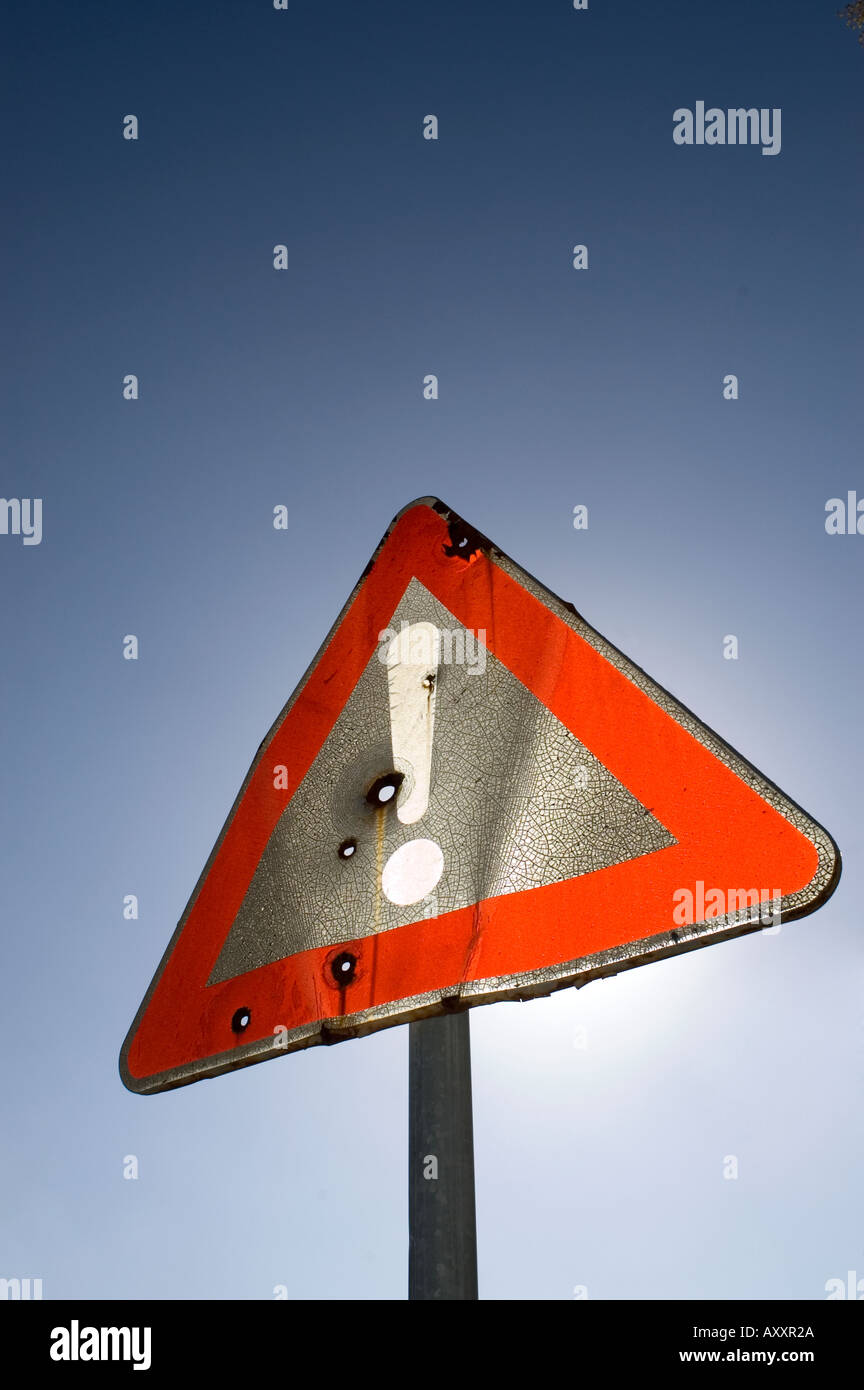Road sign with exclamation mark Stock Photo - Alamy