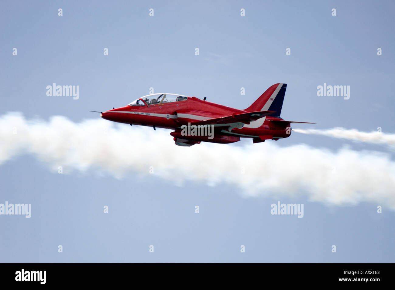 Single jet in Red Arrows display Stock Photo - Alamy