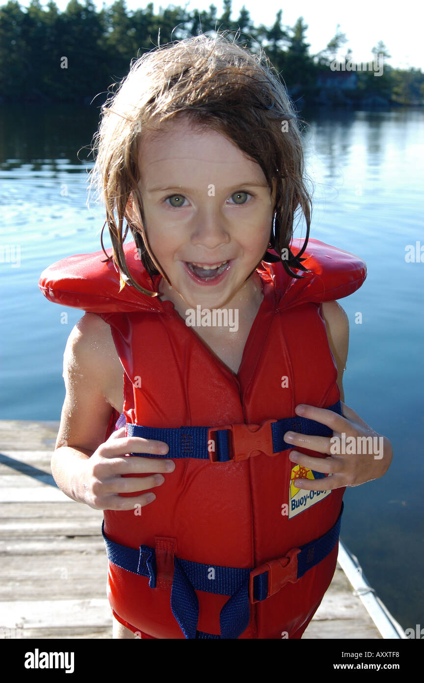 Portrait girl wearing life vest hi-res stock photography and images - Alamy