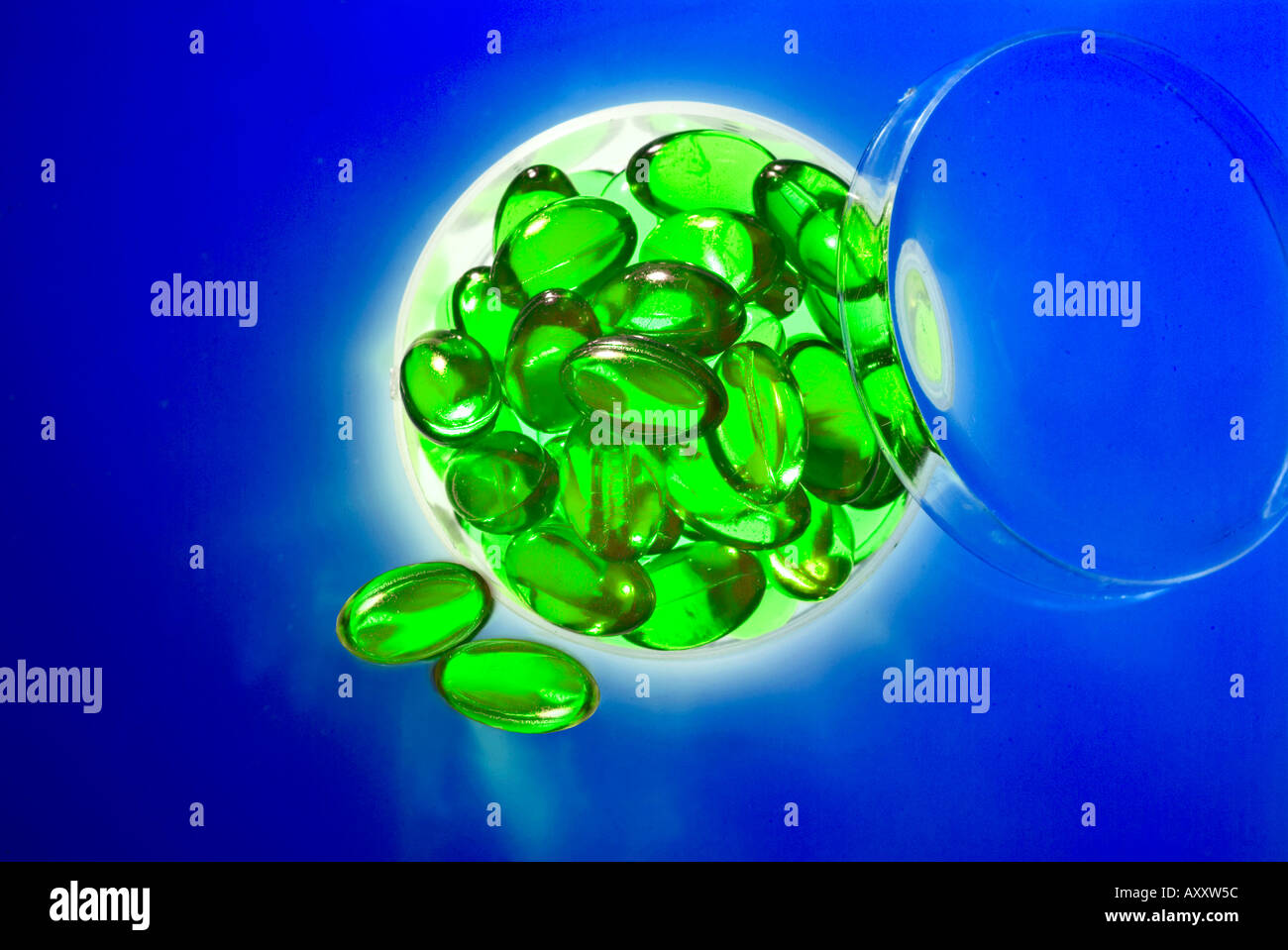 Bright green translucent gel caps close up Stock Photo - Alamy