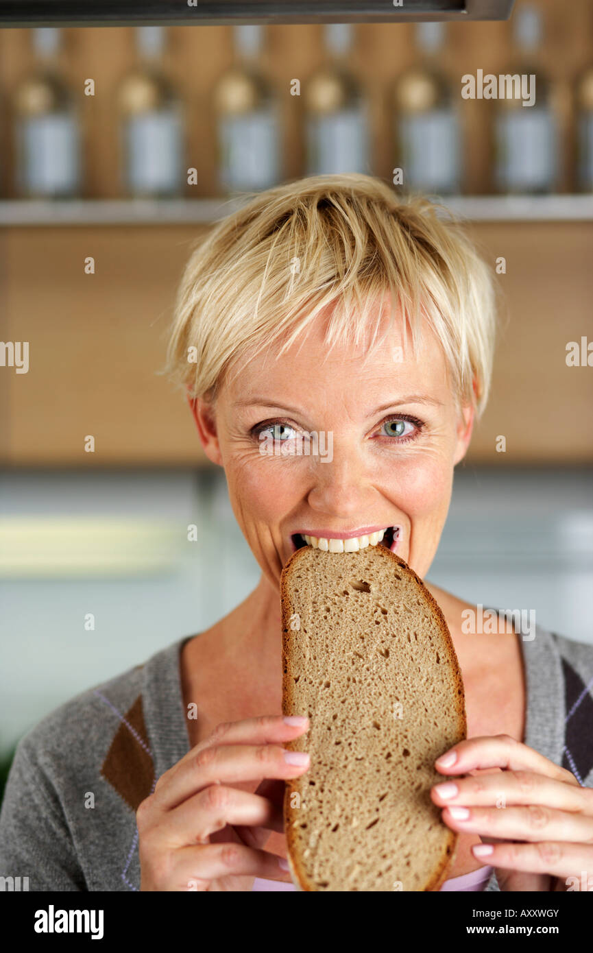 Biting into a slice of bread hi-res stock photography and images - Alamy