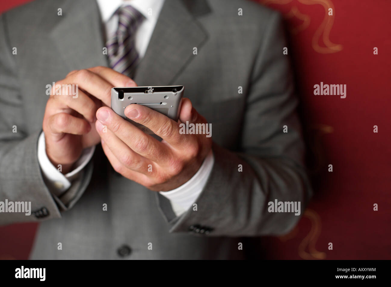 Mid section businessman using smart hi-res stock photography and images ...