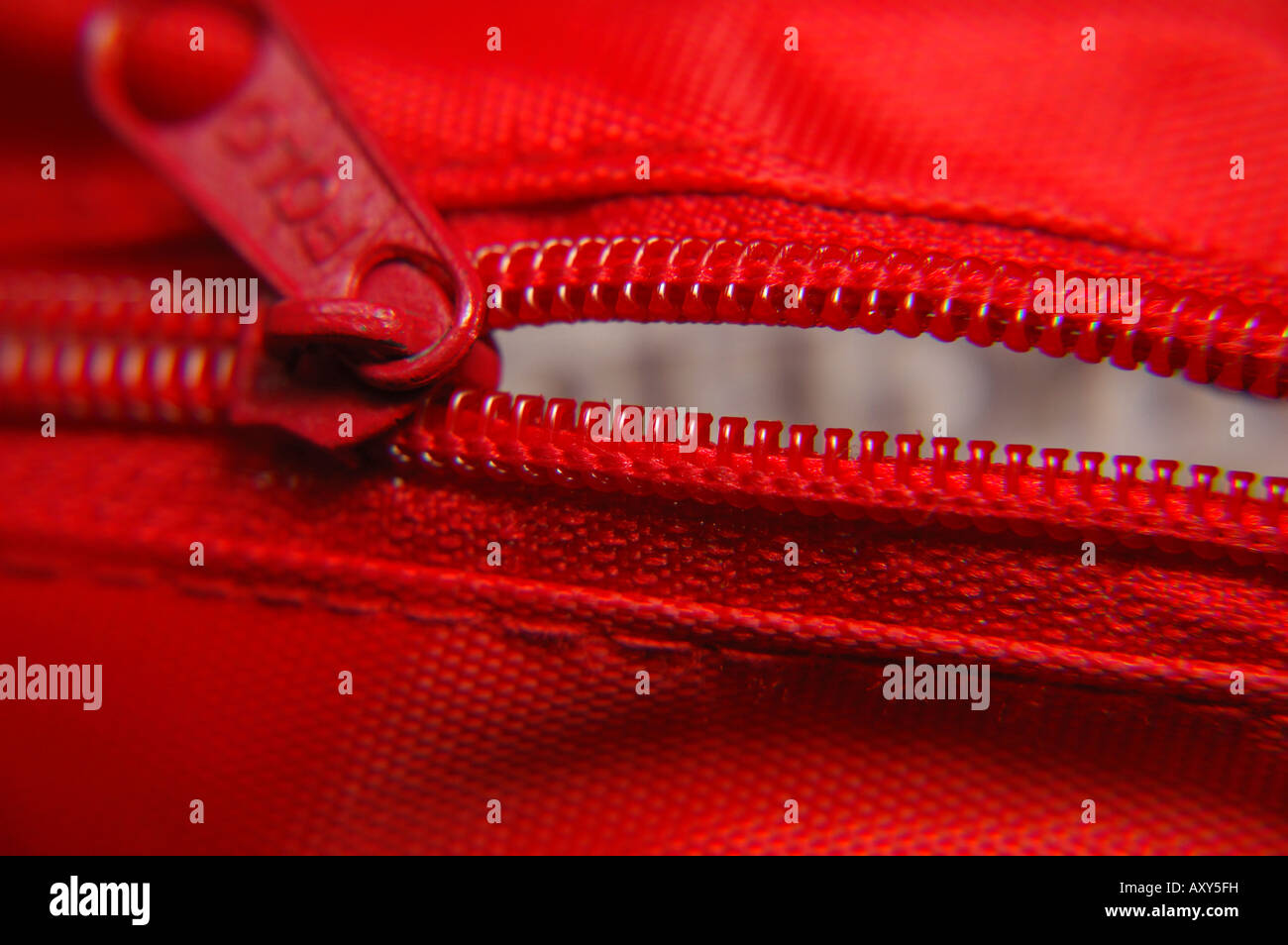 Closeup shot red zipper hi-res stock photography and images - Alamy