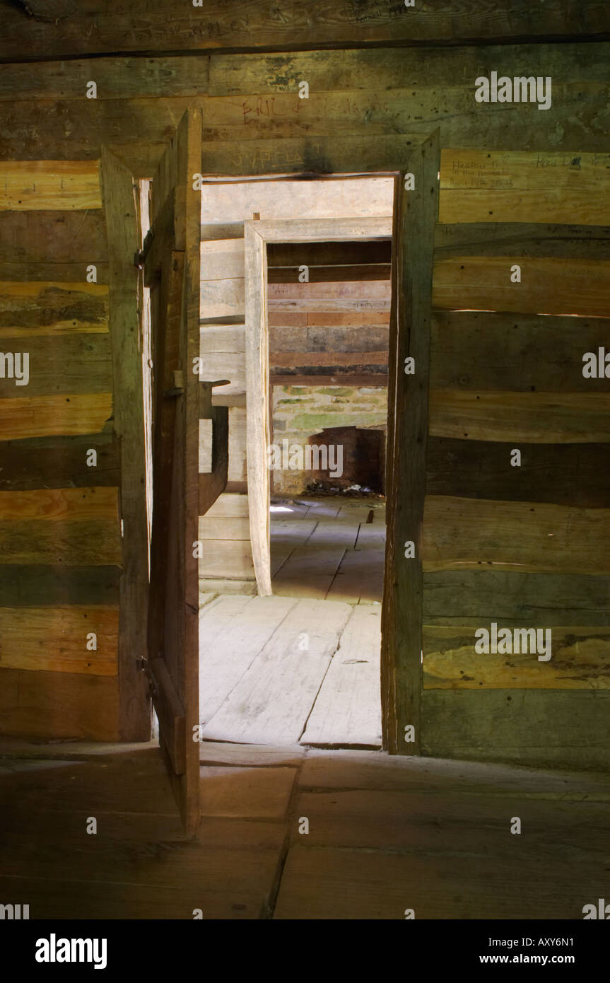 Looking through the doors of an old log cabin in the Great Smoky ...