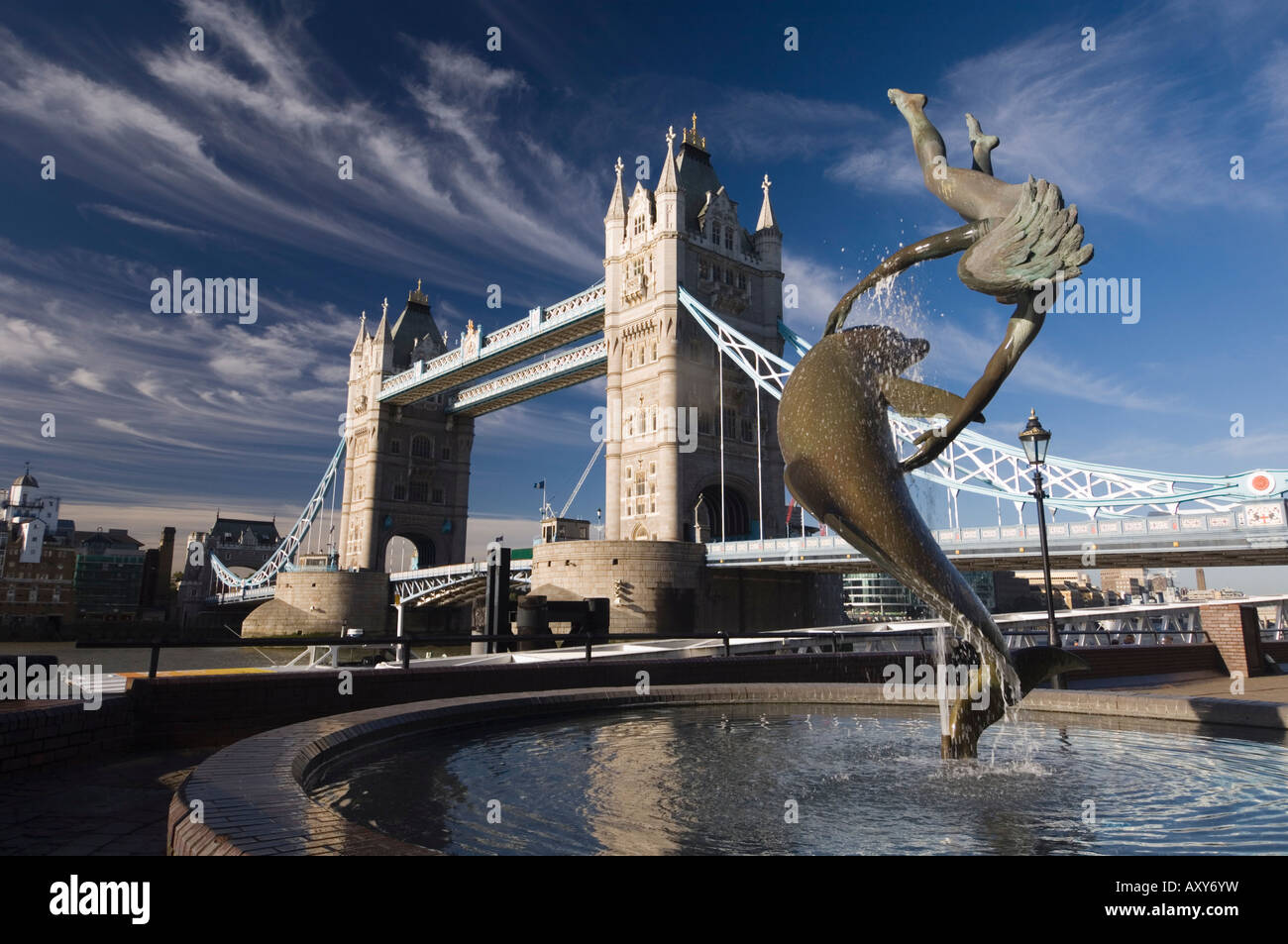 Tower Bridge and Girl with a Dolphin sculpture, London, England Stock ...