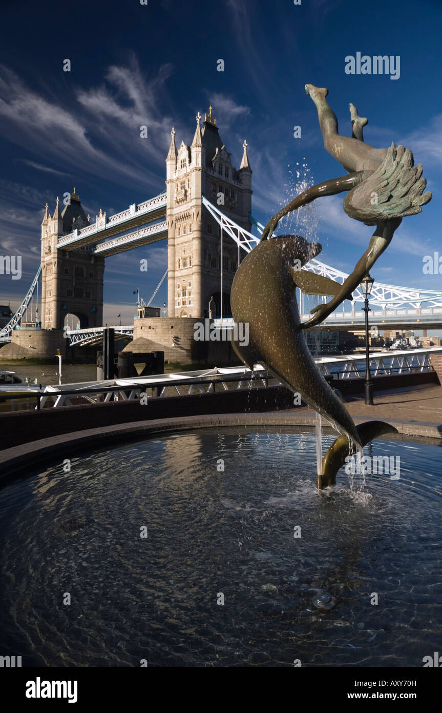 Tower Bridge and the Girl with a Dolphin sculpture, London, England ...