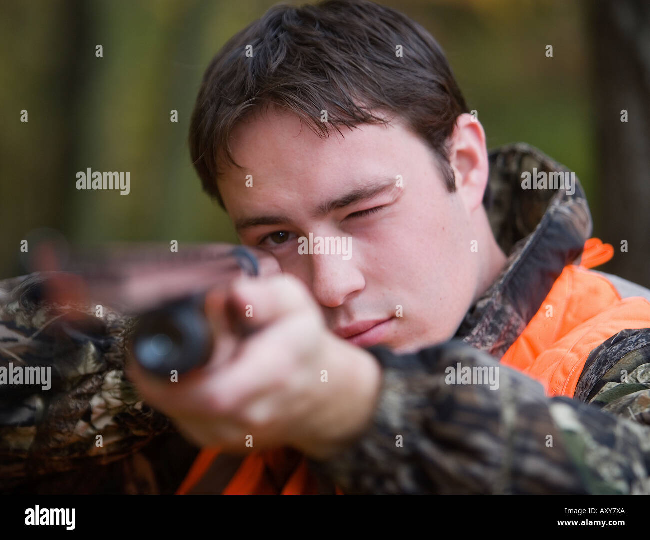 Hunter aiming his rifle Stock Photo - Alamy