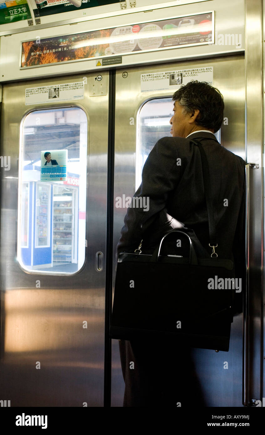 commuters during Tokyo rush hour, Japan Stock Photo - Alamy