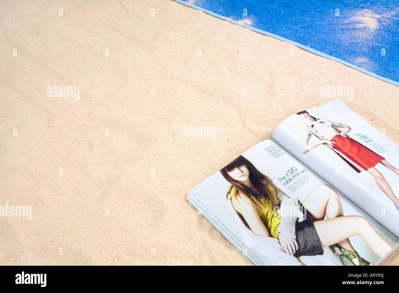 open magazine on beach Stock Photo - Alamy