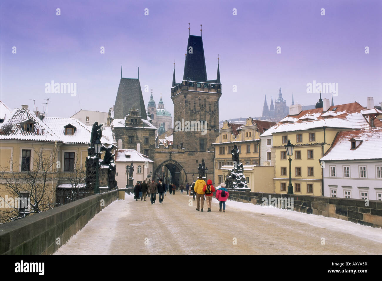 Charles Bridge and St. Vitus cathedral in winter snow, Prague, UNESCO ...