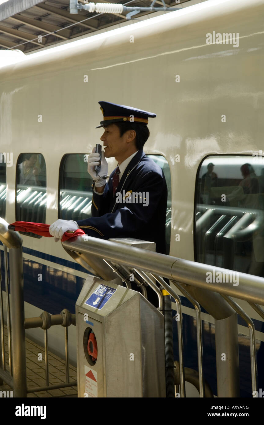 Guard on Shikansen Train, Tokyo Station, Japan Stock Photo - Alamy