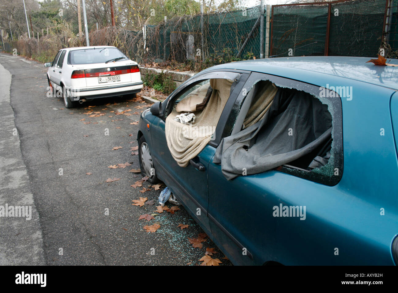 vandalised car used as a shelter by the homeless Stock Photo - Alamy