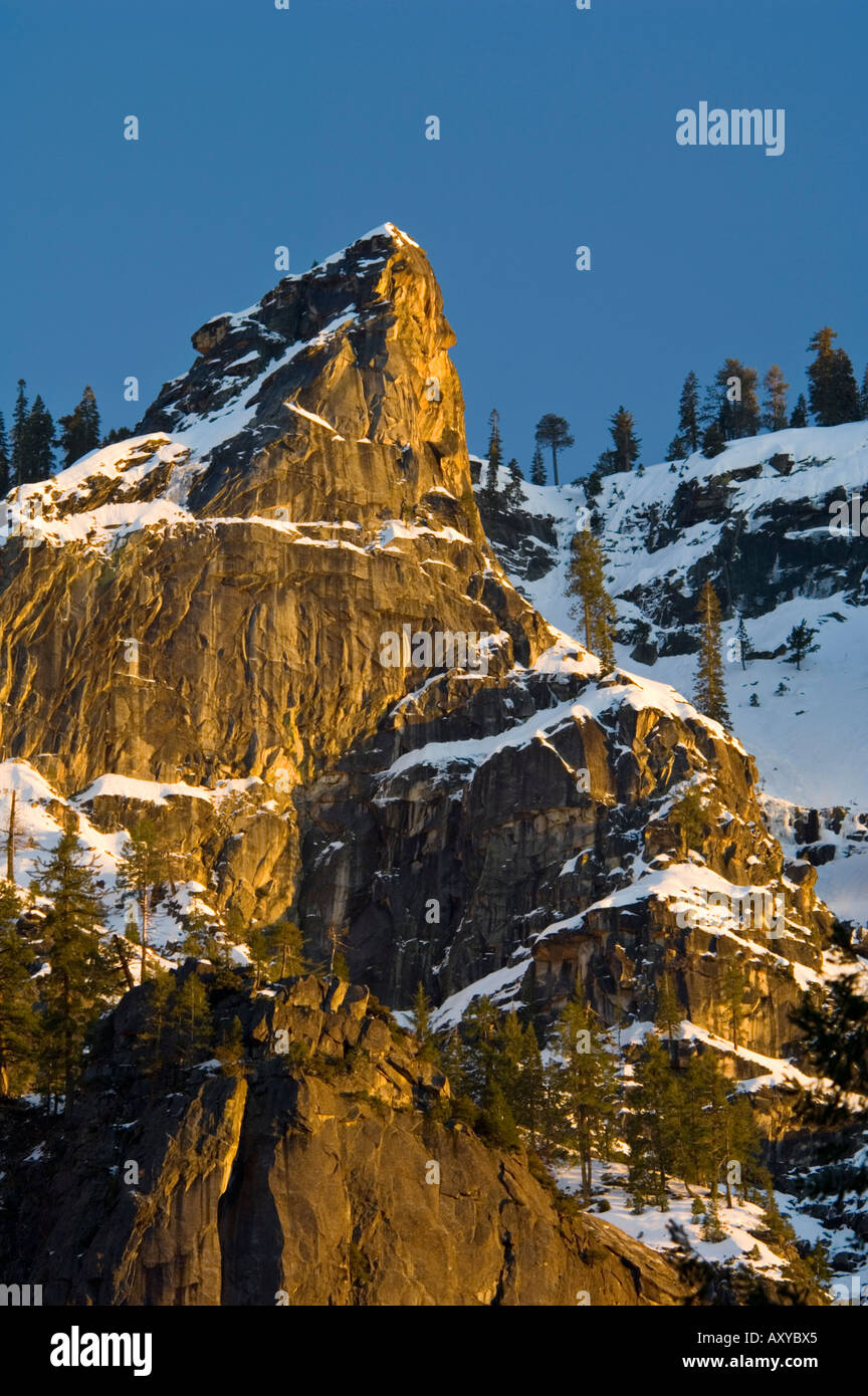 Golden Sunset light on granite rock mountain peak above Yosemite Valley ...