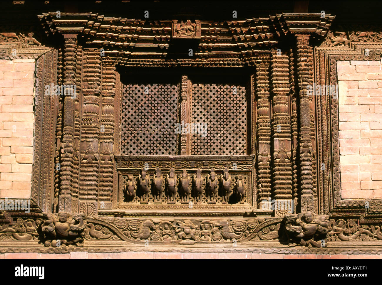 Nepal Patan carved window with jumping horse motif Stock Photo - Alamy