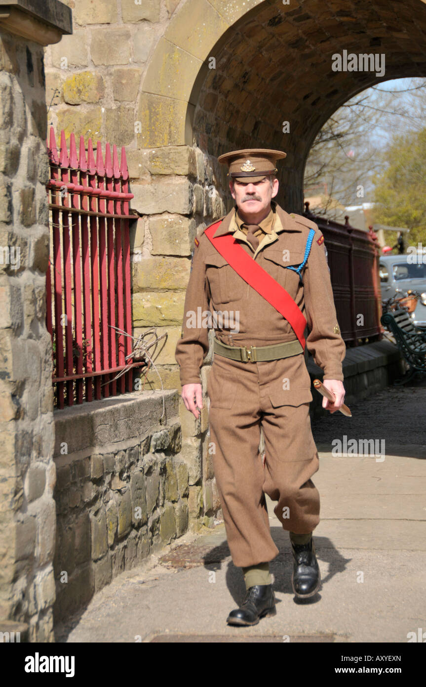Man dressed in army uniform walking down a footpath Crich forties ...