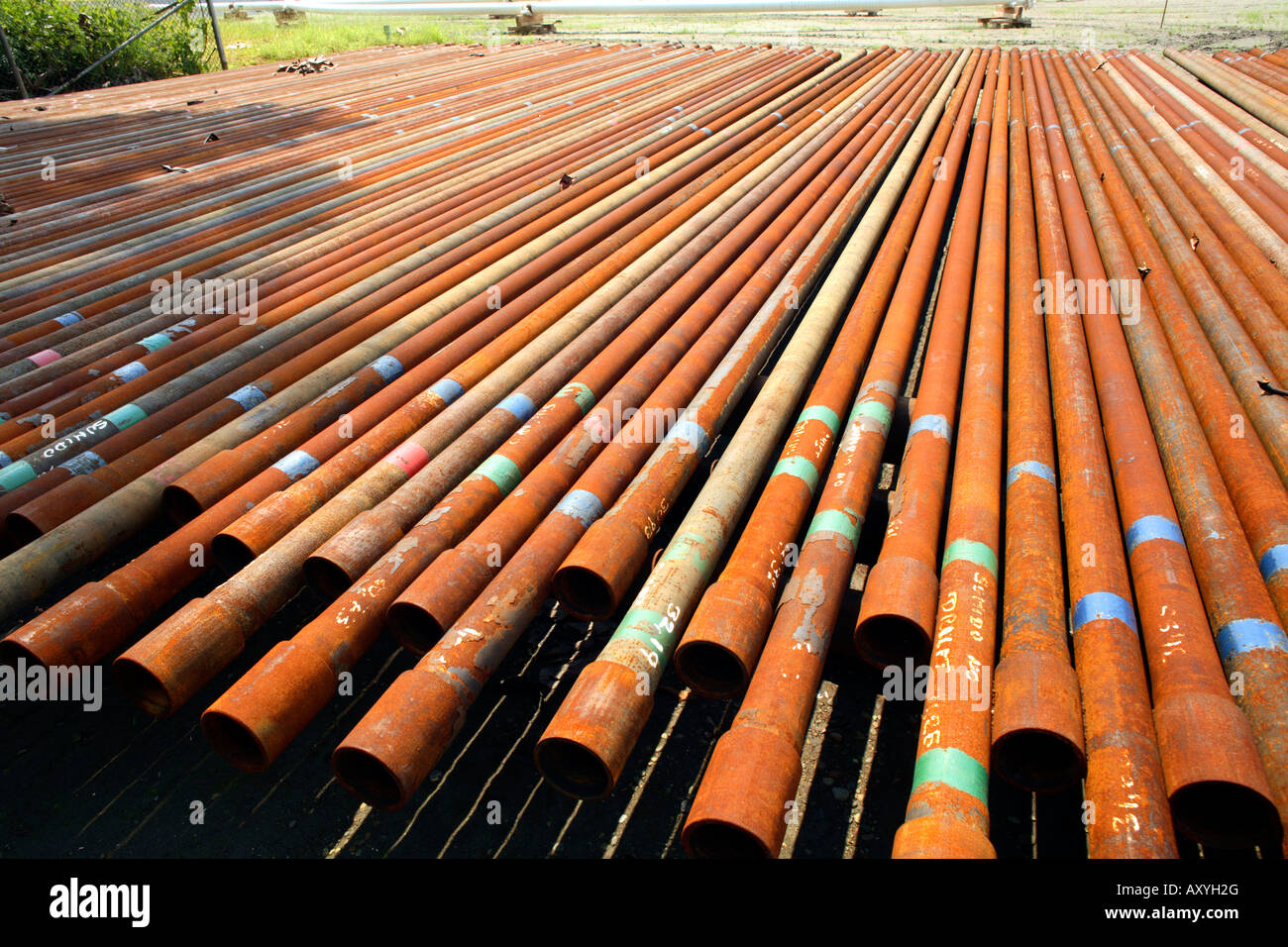 Drilling pipe stacked by an oil well in the Amazon Stock Photo - Alamy