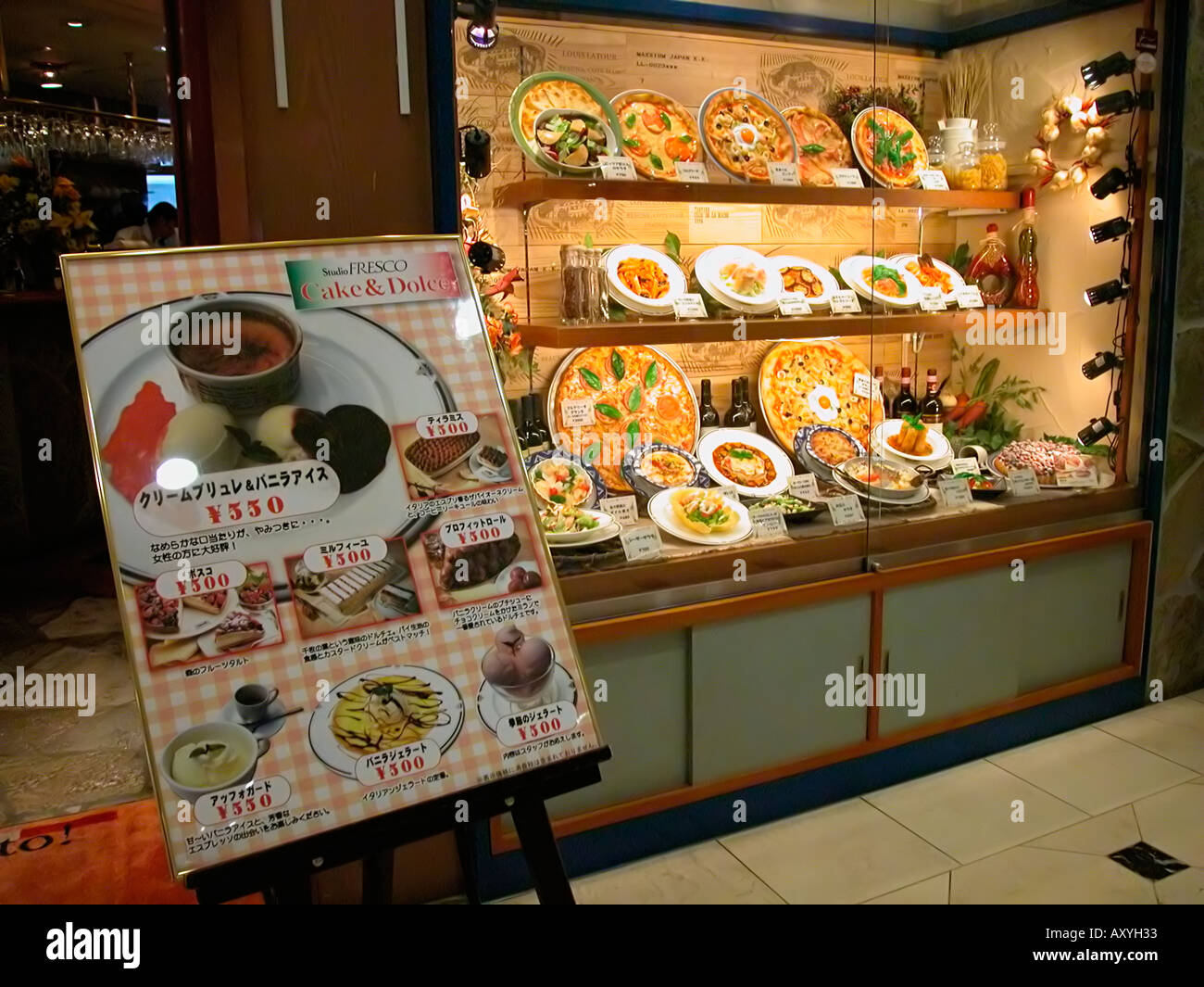 Plastic food in the window display of an Italian style restaurant on ...